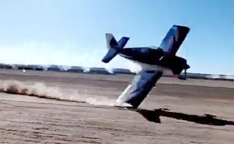 Aerobatic plane scraps its wing into the ground during low pass few ...